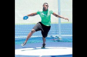 Historic gold! - Ja's Dacres wins discus throw at WYC - Jamaica Observer