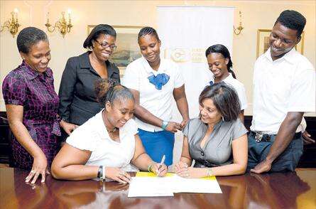 PHOTO: Cheque! - Jamaica Observer