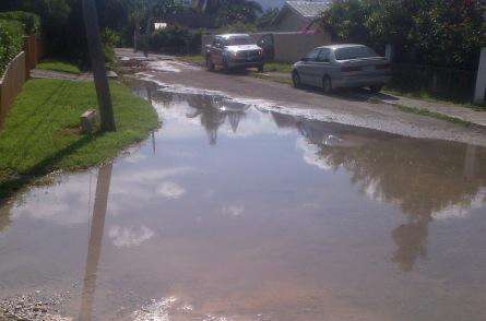 Broken water main flooding Barbican community - Jamaica Observer