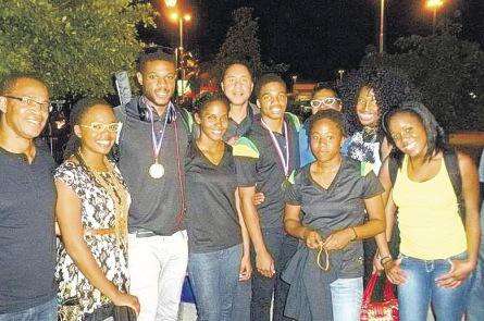 Senior badminton team home - Jamaica Observer