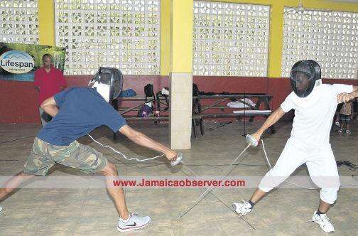 Keeth Smart conducts fencing demonstration at Wolmer's Boys' - Jamaica ...