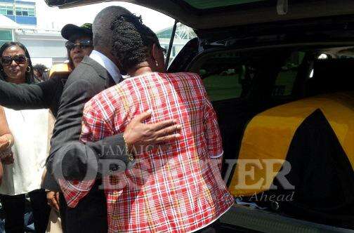 PHOTOS: Roger Clarke’s body arrives at NMIA - Jamaica Observer