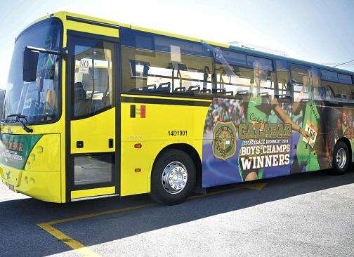 Observer 'Champs' photos wrap JUTC buses - Jamaica Observer
