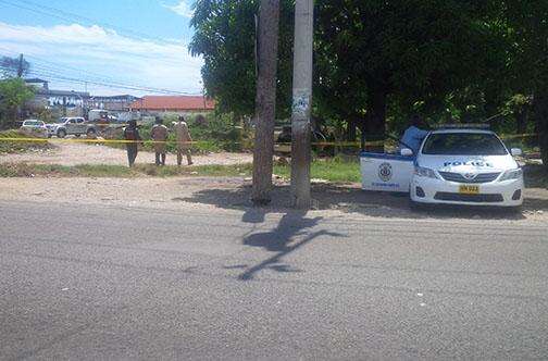Bullet-riddled body found in car on St John's Road - Jamaica Observer