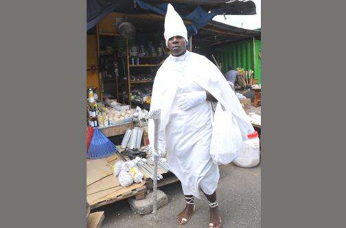 Robed in white - Jamaica Observer
