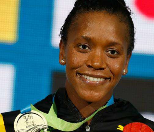 Alia Atkinson wins 100m breaststroke gold at Short Course Worlds ...