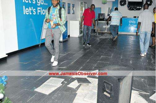 Eerie episode sparks fear, damage in FLOW store - Jamaica Observer