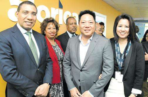PHOTO: PM tours Alorica - Jamaica Observer