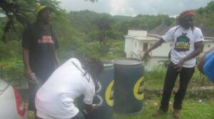 JET donates 89 garbage drums to Nine Miles community - Jamaica Observer