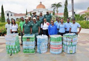 PHOTO: Trash to bins - Jamaica Observer