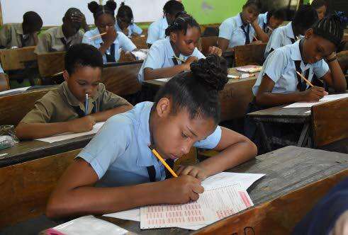 Exam mode: Students tackle GSAT - Jamaica Observer
