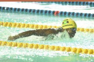 Cheerful Johnson bows out of Carifta Swim Champs in style - Jamaica ...