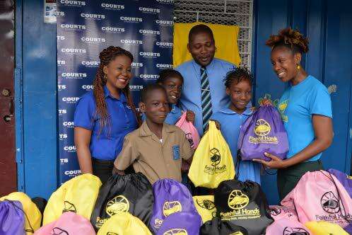 Clan Carthy students receive back-to-school support from Courts ...