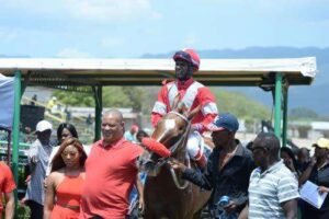 Omar walks in front - Jamaica Observer