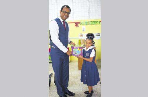 ARC donates storybooks to Dupont Primary - Jamaica Observer