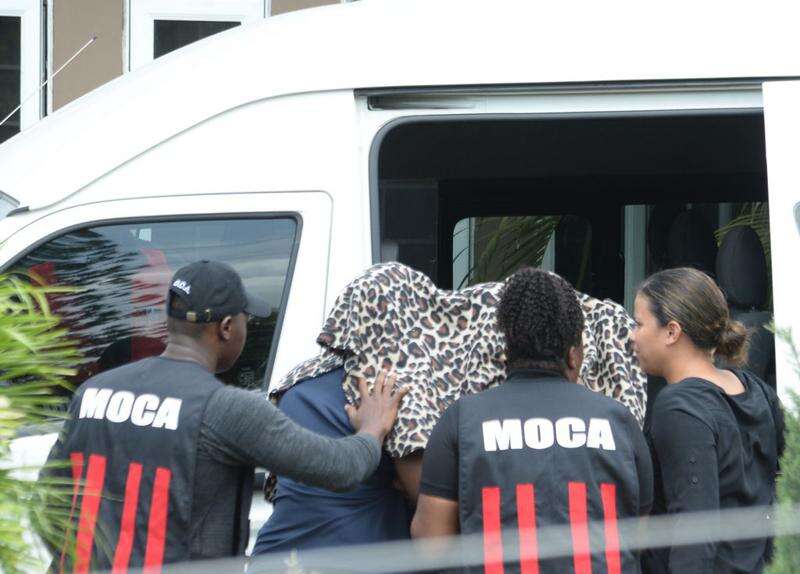 PHOTO: Ruel Reid detained - Jamaica Observer