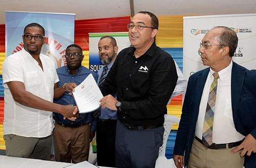 Ground broken, contract signed for Dr Kenneth Baugh Health Centre ...