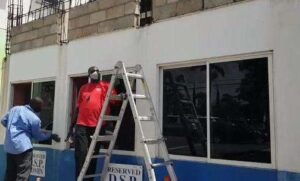 Mandeville Police Station repainted as part of Labour Day activities ...
