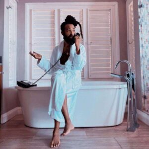 Shocking! Protoje removes his hat, poses in bathrobe - Jamaica Observer