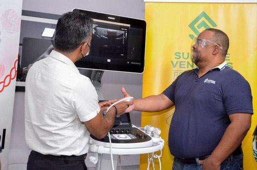 UHWI gifted with mobile ultrasound machine - Jamaica Observer