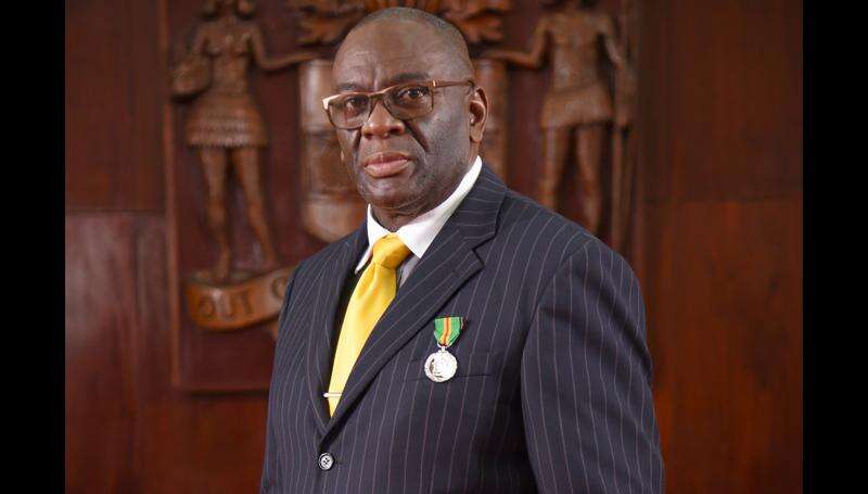 Businessman Dwight Moore 'ecstatic' after receiving Badge of Honour for ...