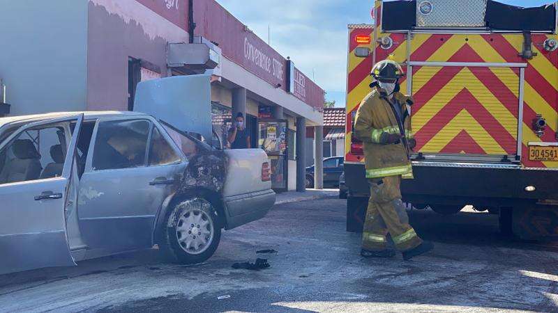 Benz catches fire at Mandeville gas station - Jamaica Observer