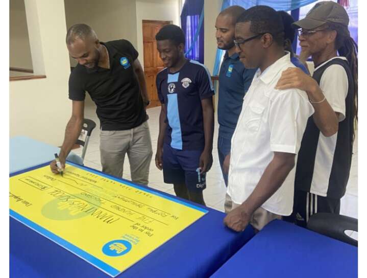 Manning's football team boosted by Dolla - Jamaica Observer