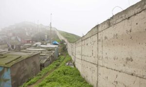 Peru court orders demolition of 'Wall of Shame' dividing rich and poor ...