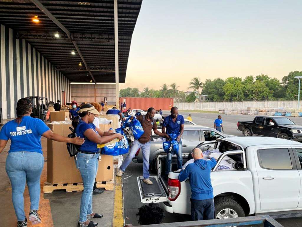 Food For The Poor presents packages to needy persons islandwide ...