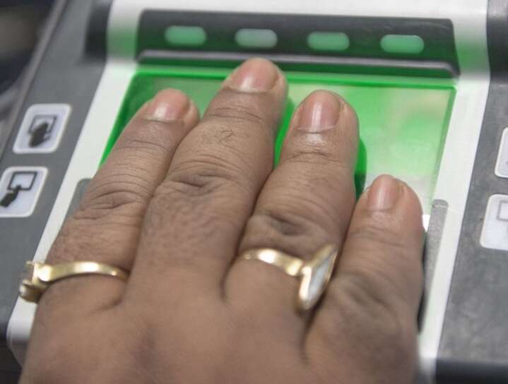 Submitting biometric information for visa processing - Jamaica Observer