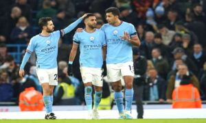 Man City fight back on the field to close on Arsenal - Jamaica Observer