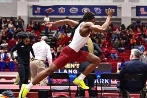 Arkansas jumps coach Geopfert raises toast to Champs - Jamaica Observer