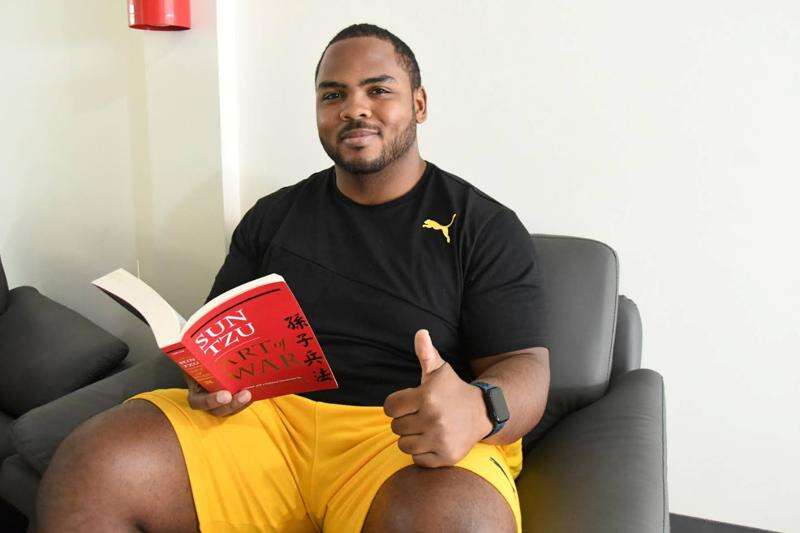 Wrestler Aaron Johnson begins gold medal quest - Jamaica Observer