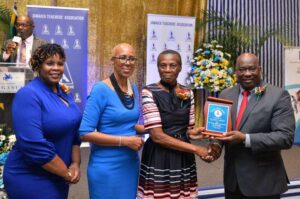 Retired educator receives Golden Torch Award for 49 years of service ...