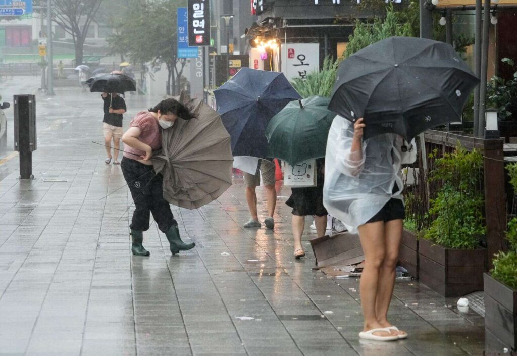 Tropical storm blows strong winds and heavy rains into South Korea ...