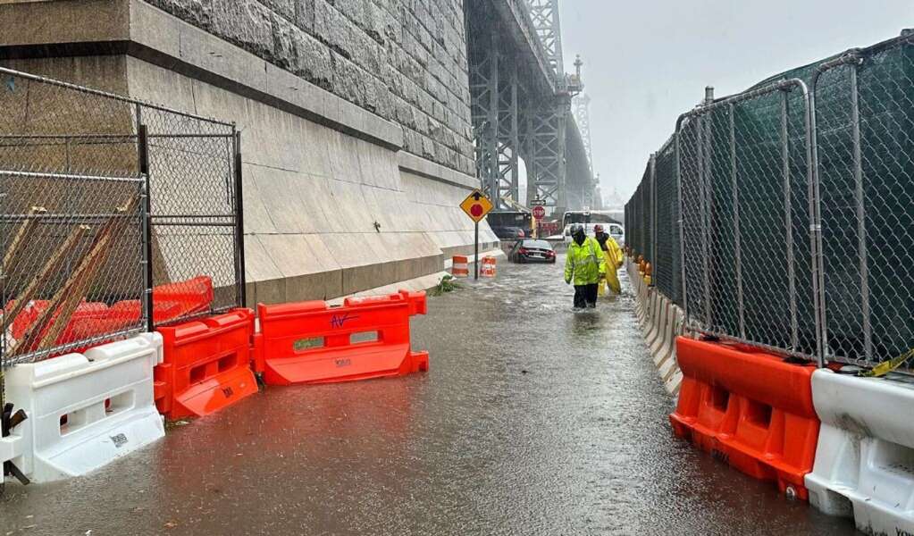 Rush-hour storm floods NYC area, swamping streets and stranding people ...