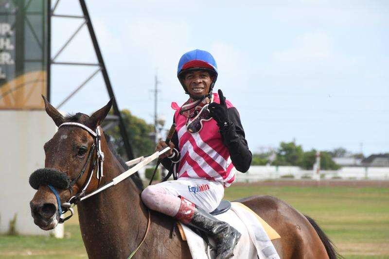 Jockey Roger Hewitt continues winning form on Bin Laden - Jamaica Observer