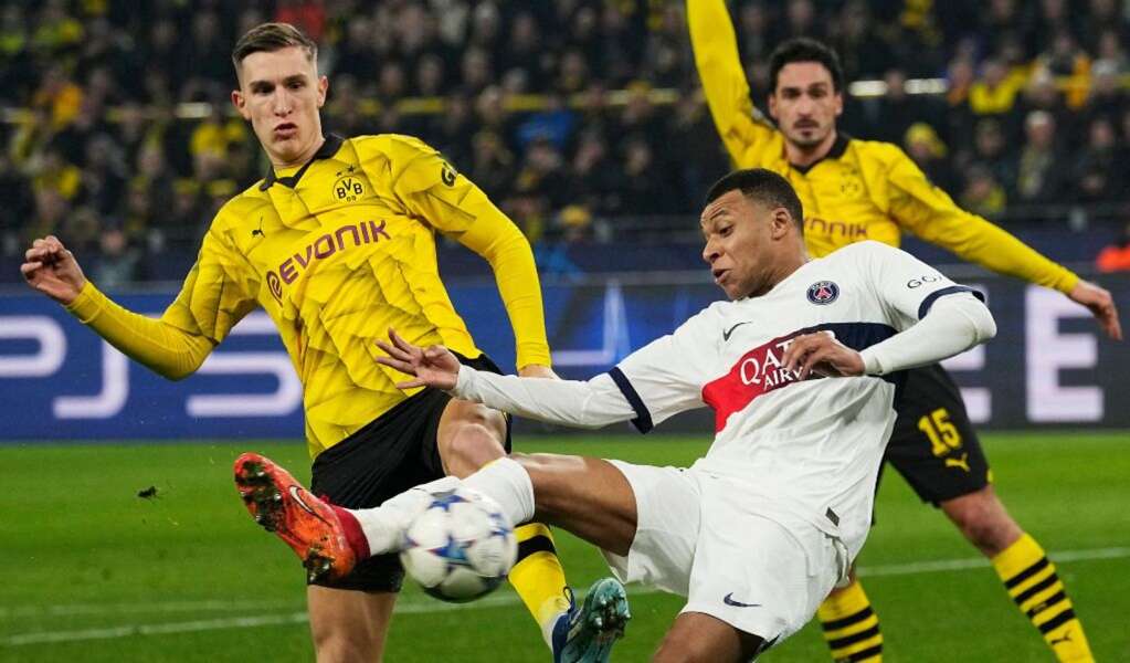 PSG squeezes into Champions League knockout stage with 1-1 draw at ...