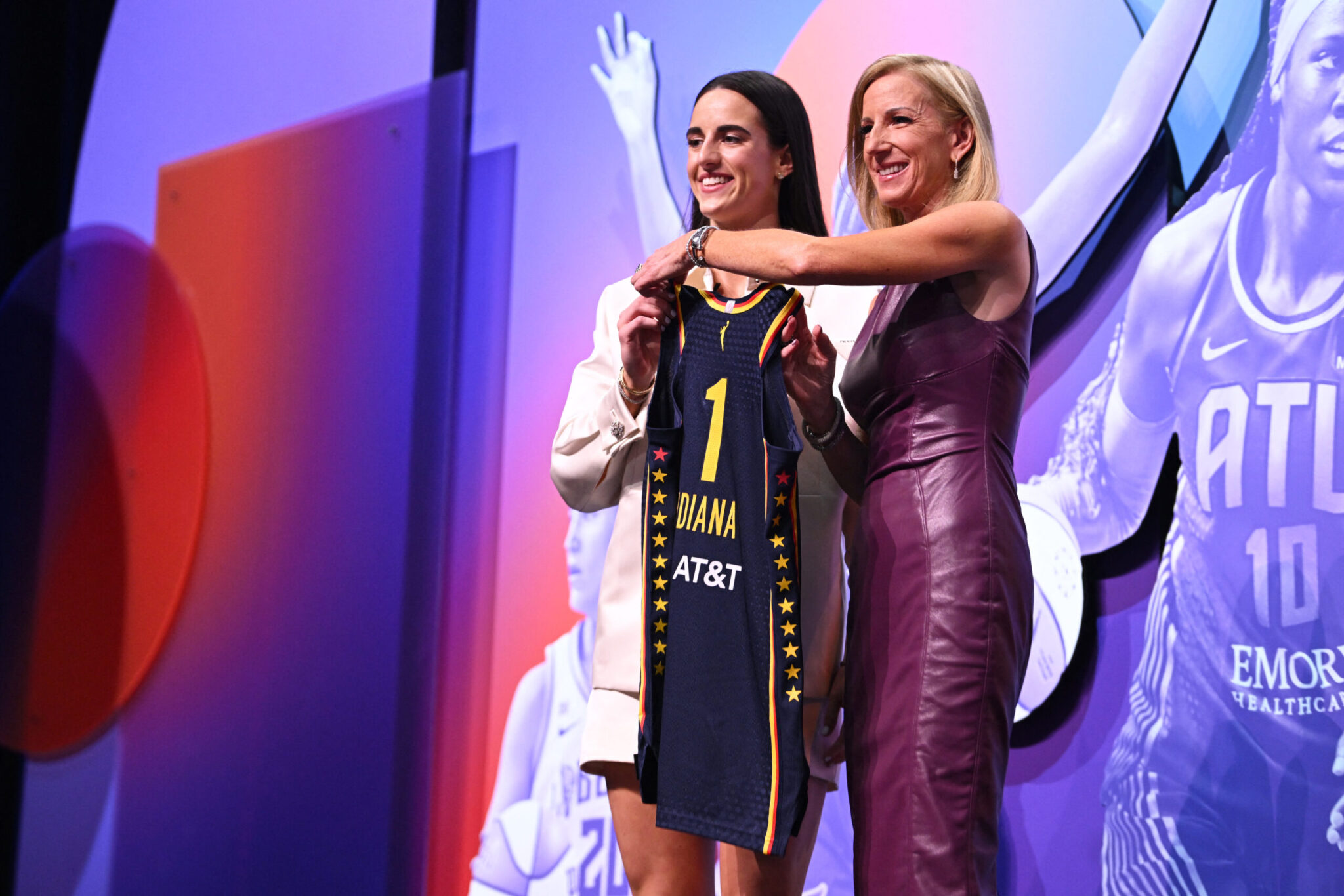 College basketball phenom Caitlin Clark selected first in WNBA draft ...