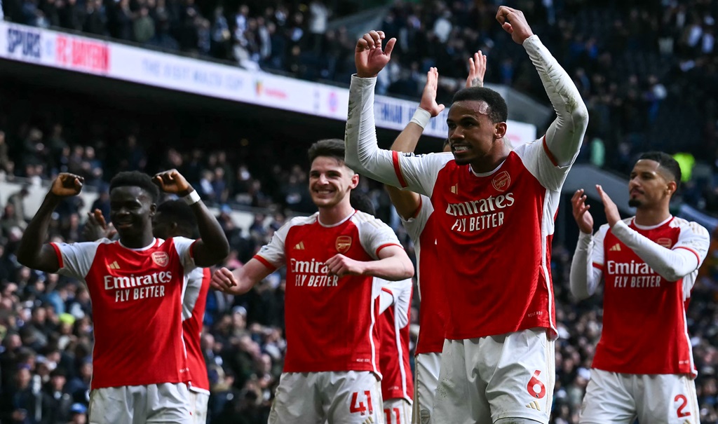 Arsenal survive Spurs fightback to boost title charge - Jamaica Observer