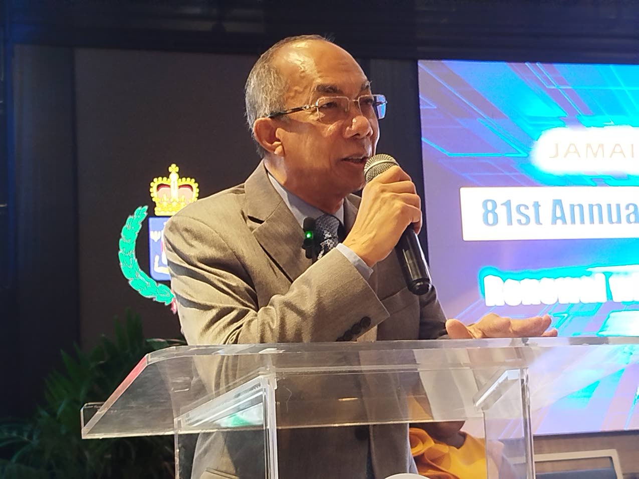 Chang ‘concerned’ after gun attack on senior cop - Jamaica Observer