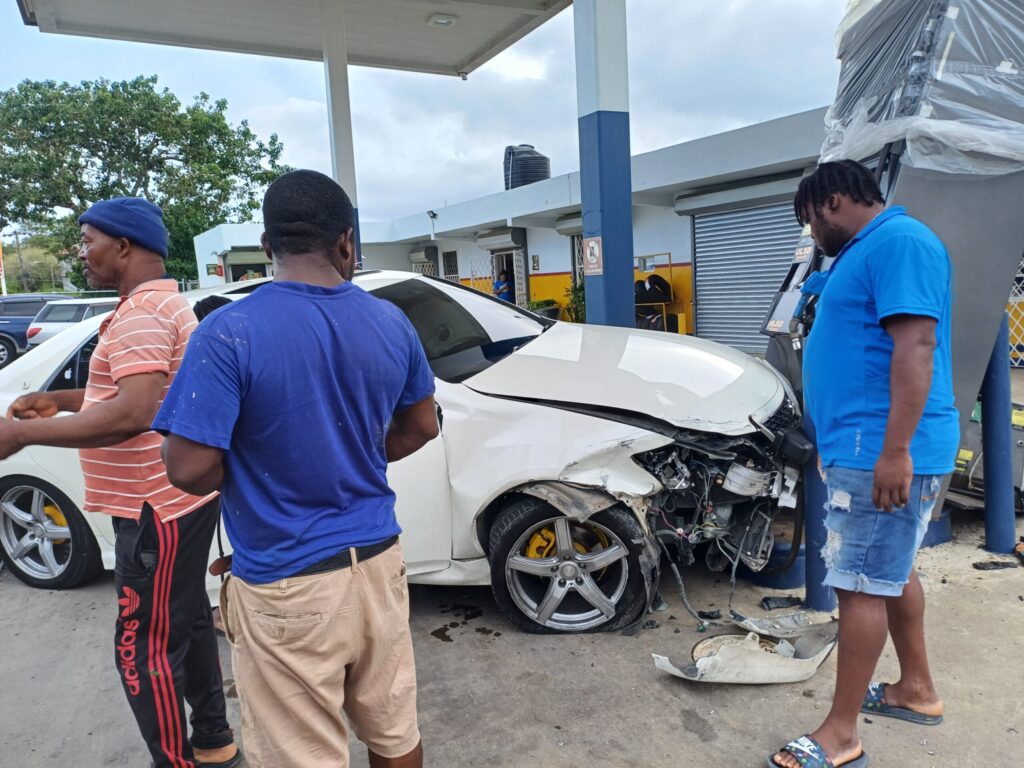 Drivers escape injury after cars crash near gas station - Jamaica Observer