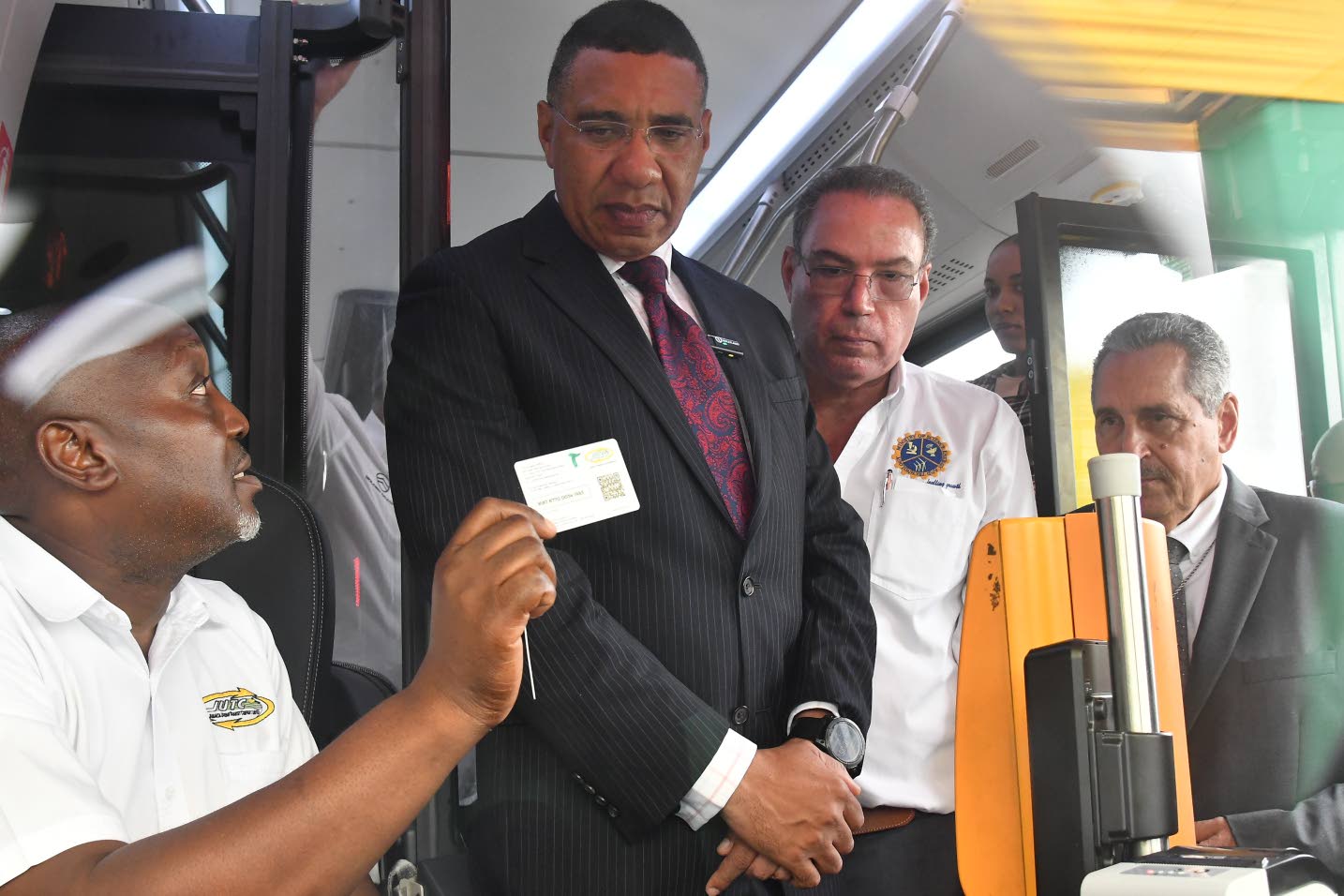 Clarke hailed for hand in 100 new JUTC buses - Jamaica Observer