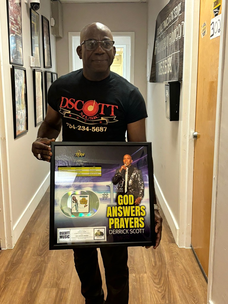 Derrick Scott receives plaque for chart topping ‘God Answers Prayers ...