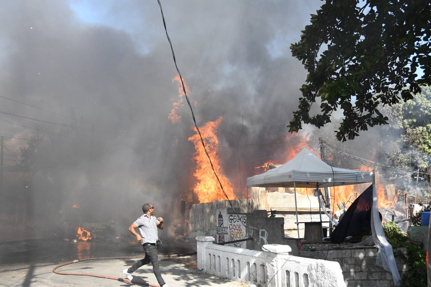 Brave young men rescue elderly man from house fire - Jamaica Observer