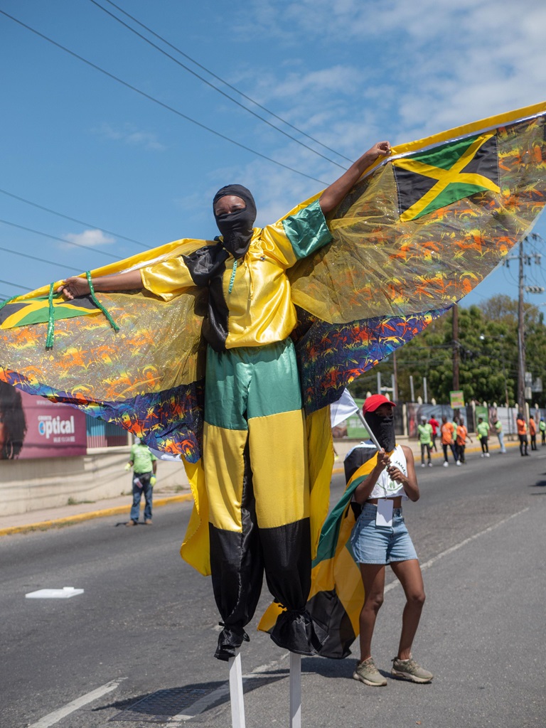 A conversation with stilt walkers at carnival - Jamaica Observer