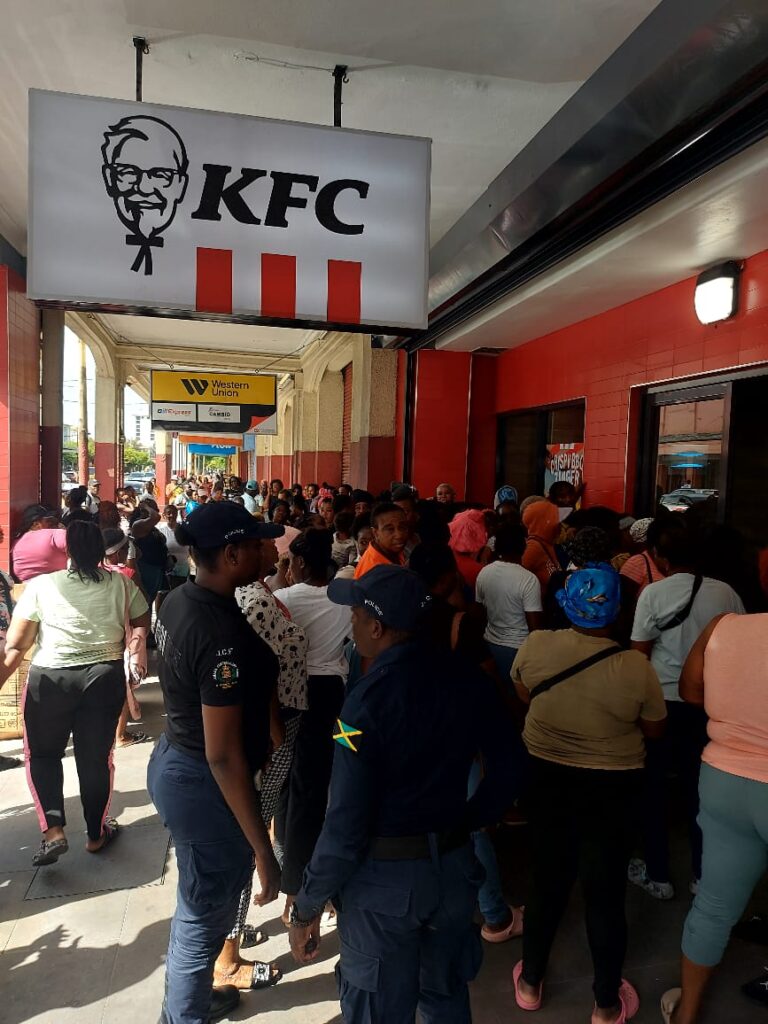 Chicken frenzy: Jamaicans flock KFC locations for 50th anniversary deal - Jamaica Observer