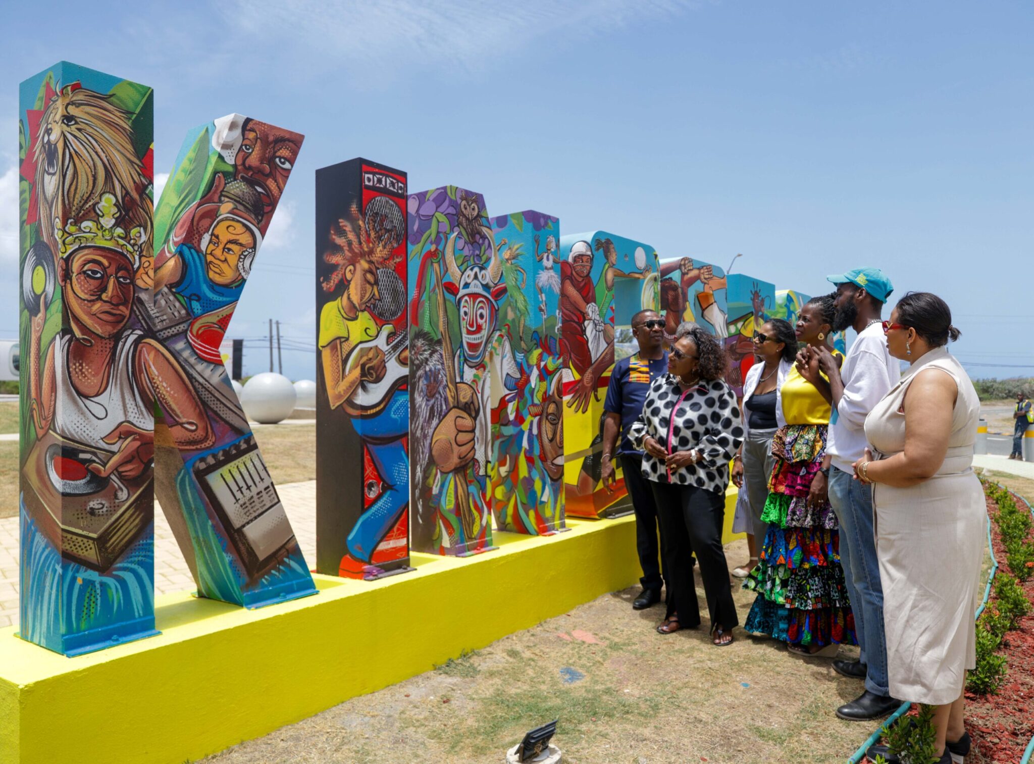 Kingston airport roundabout gets facelift with vibrant, cultural mural ...