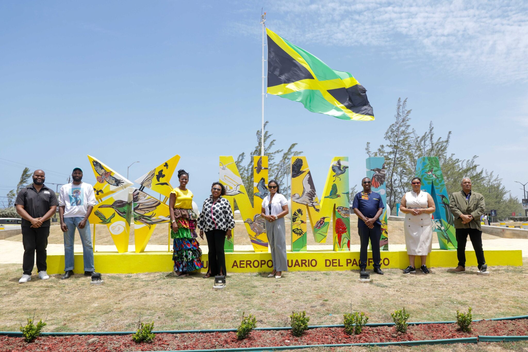 Kingston airport roundabout gets facelift with vibrant, cultural mural ...