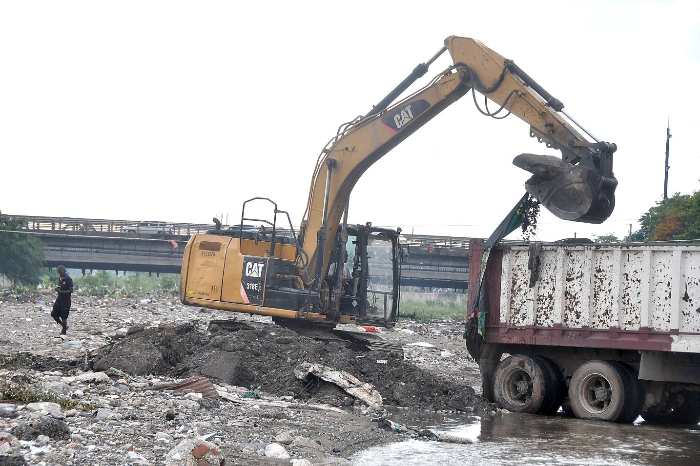 Government races to clear Sandy Gully ahead of Tropical Storm Melissa ...